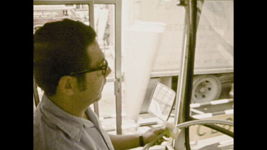 1970s: Bus Driver Pays Woman Stock Footage Video (100% Royalty-free ...