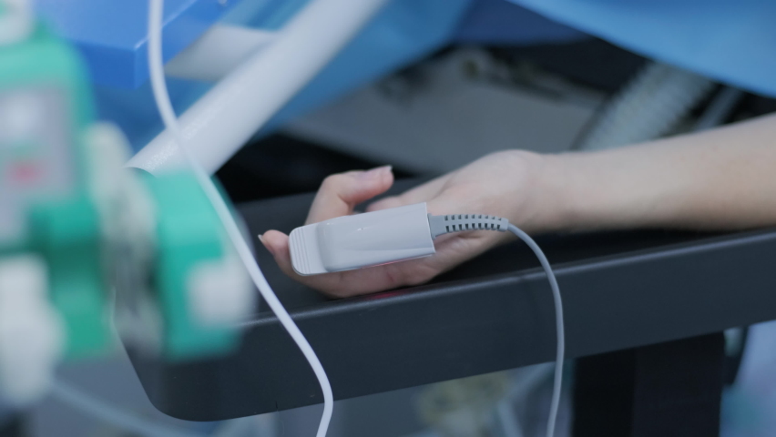 girl's hand pulse oximeter operating room Stock Footage Video (100% ...