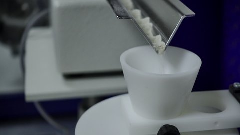 White Powder Pouring Into Container On Stock Footage Video (100% ...