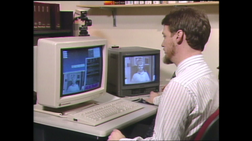 1990s: Man Speaks and Operates Stock Footage Video (100% Royalty-free ...