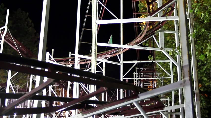 roller coaster ride on dark afternoon Stock Footage Video (100% Royalty ...