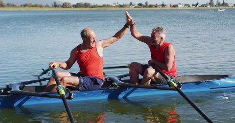 Two Senior Caucasian Men Rowing Boat Stock Footage Video (100% Royalty ...