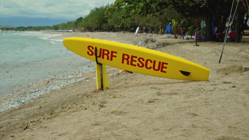 yellow surfboard on beach red text Stock Footage Video (100% Royalty ...