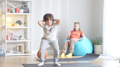 Happy Siblings Children Making Yoga Home Stock Photo (Edit Now) 1693450243