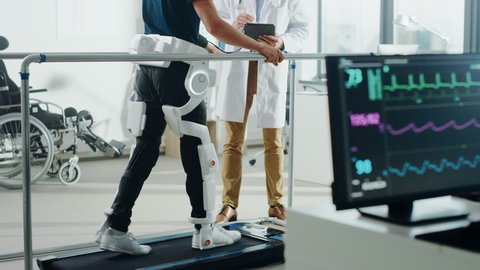 modern hospital physical therapy doctor uses Stock Footage Video (100% ...