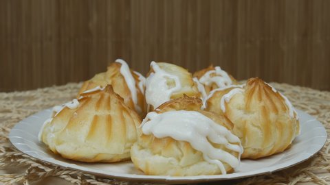 Round Eclairs Covered White Glaze Rotate Stock Footage Video (100% ...