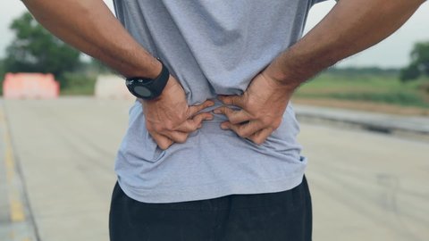 Young Man Back Injury After Exercise Stock Footage Video (100% Royalty ...