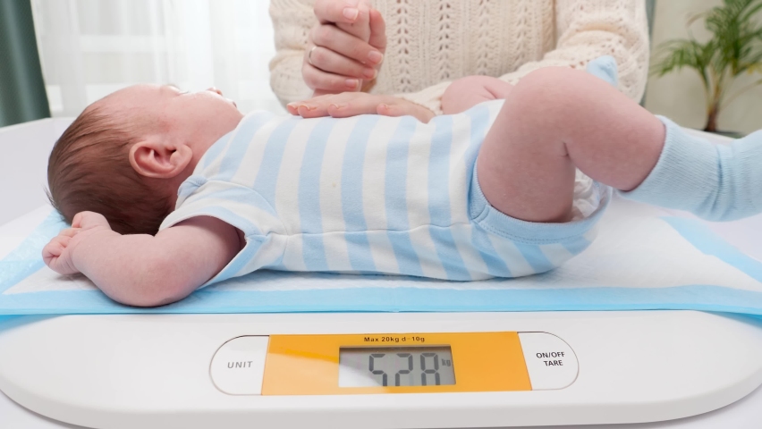 Newborn Scales Stock Video Footage - 4K and HD Video Clips | Shutterstock