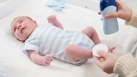 Young Caring Mother Applying Baby Oil Stock Footage Video (100% Royalty ...