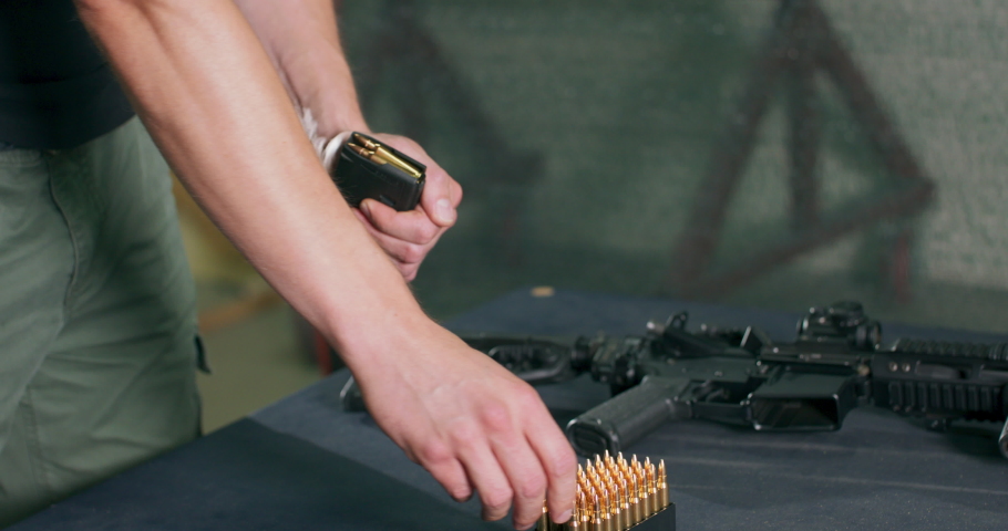 Closeup Male Hands Loading Bullets Into Stock Footage Video (100% ...