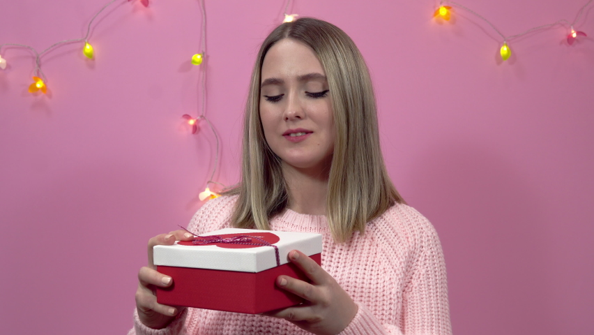 woman opens gift box looks what's Stock Footage Video (100% Royalty ...