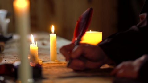 cinematic ancient man writing by candle Stock Footage Video (100% ...