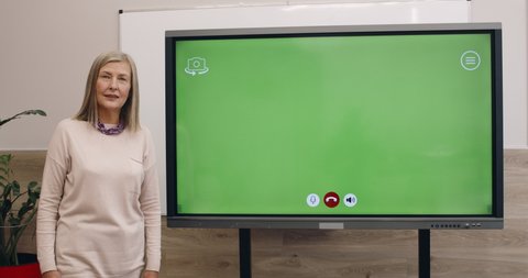 Female Teacher Talking Turning Interactive Screen Stock Footage Video ...