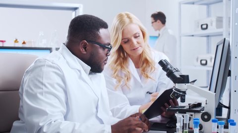 4k Science Lab Scientists Working On Stock Footage Video (100% Royalty ...