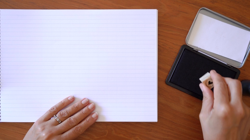 Rubber stamp top view Stock Video Footage - 4K and HD Video Clips ...