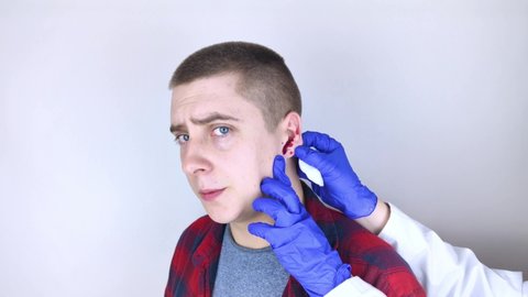 Ear bleeding Stock Video Footage - 4K and HD Video Clips | Shutterstock