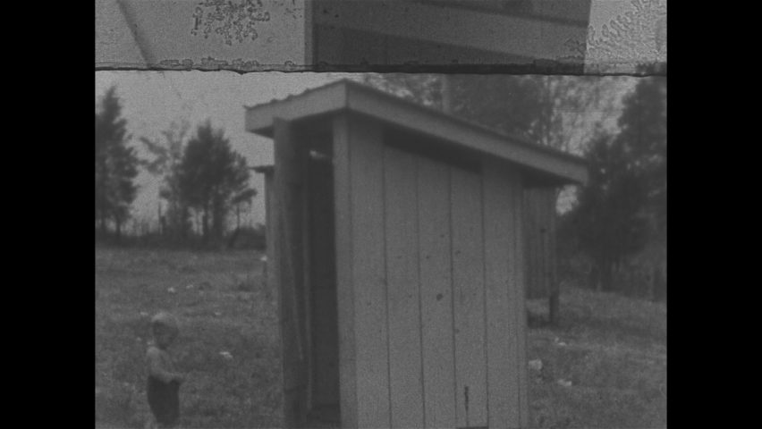1940s boy enters outhouse closes door Stock Footage Video (100% Royalty ...