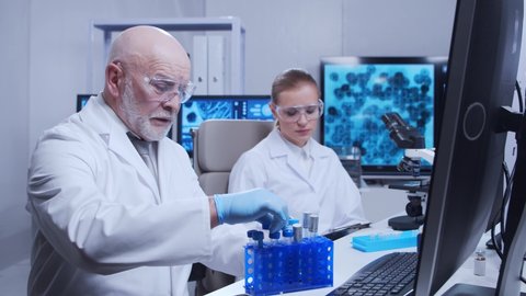 Elderly Professor Young Laboratory Assistant Doing Stock Footage Video ...