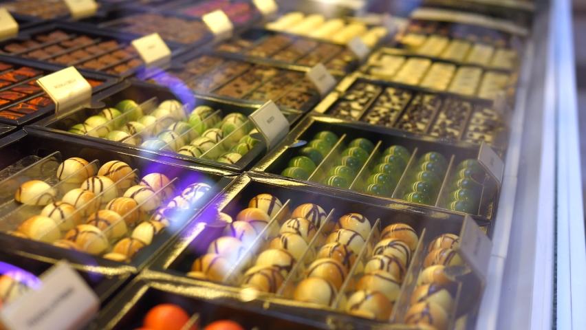 display chocolate artisan pralines wide assortment Stock Footage Video ...