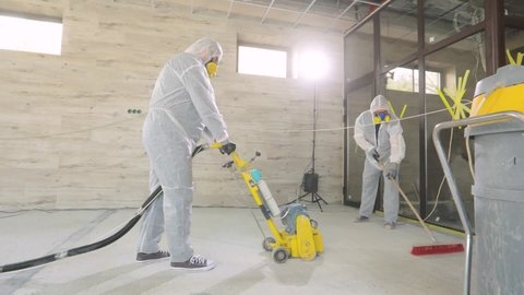 Workers Protective Suits Grinding Concrete Floor Stock Footage Video ...