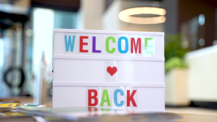 lightbox inscription welcome back we open Stock Footage Video (100% ...