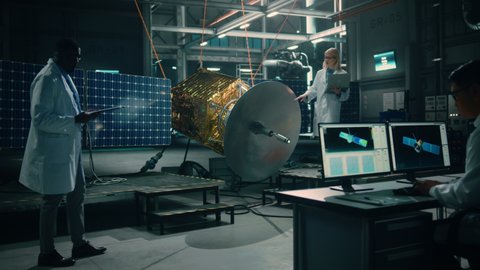 Engineer Technician Working On Satellite Construction Stock Footage ...