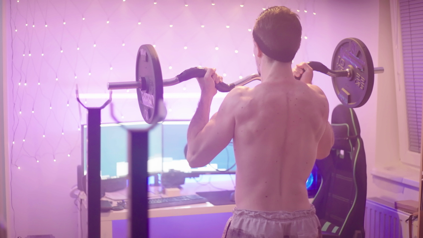 attractive gamer man make gains biceps Stock Footage Video (100% ...