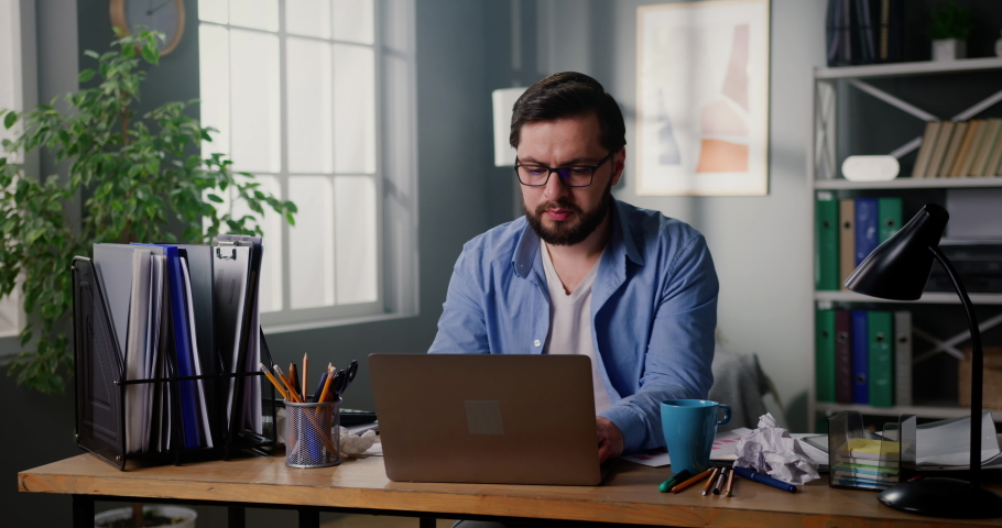 young man finished work home office Stock Footage Video (100% Royalty ...