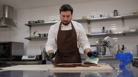 Male Pastry Chef Tempering Chocolate Professional Stock Footage Video ...
