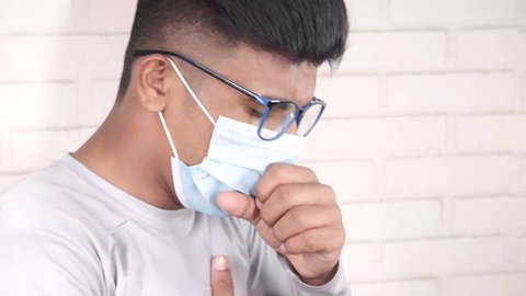 Young Sick Man Face Mask Coughing Stock Footage Video (100% Royalty ...