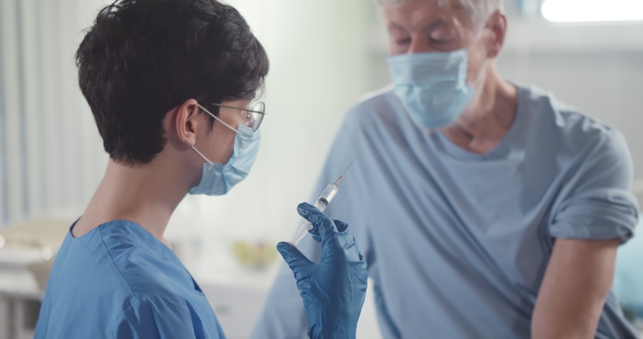 Professional Doctor Giving Covid19 Vaccine Injection Stock Footage ...