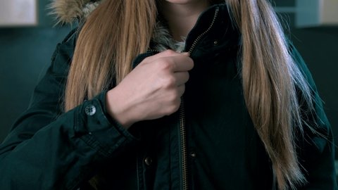 Woman unzip jacket Stock Video Footage - 4K and HD Video Clips ...
