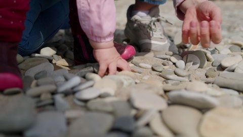 Cute Little Girl Picks Pebble On Stock Footage Video (100% Royalty-free ...