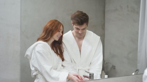 Happy Young Couple Washing Hands Together Stock Footage Video (100% ...