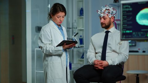 Man Sitting On Neurological Chair Brainwave Stock Footage Video (100% ...