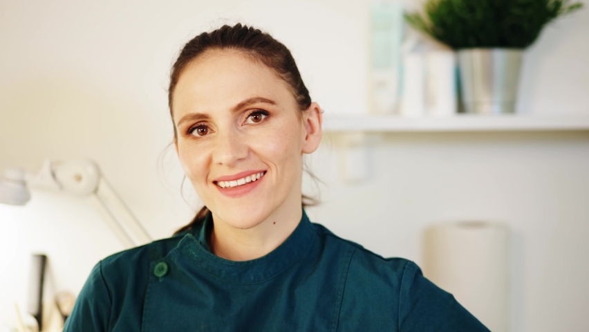 female waxing master standing smiling you Stock Footage Video (100% ...