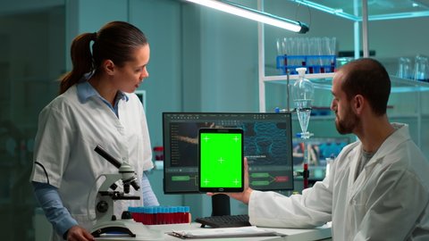 Medical Research Scientists Using Notepad Green Stock Footage Video ...
