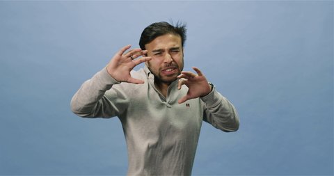 Asian Man Fighting Wind Blue Background Stock Footage Video (100% ...