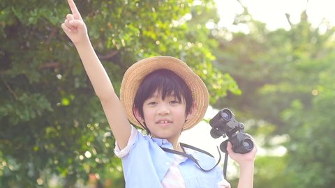 Cute Asian Child Using Binocular Point Stock Footage Video (100% ...