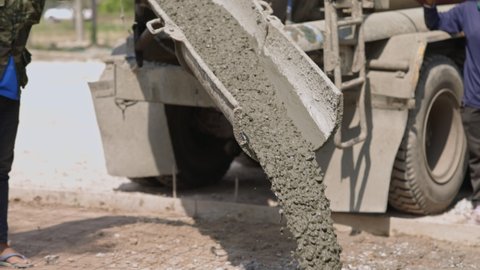 Workers Spreading Concrete That Flows Pouring Stock Footage Video (100% ...