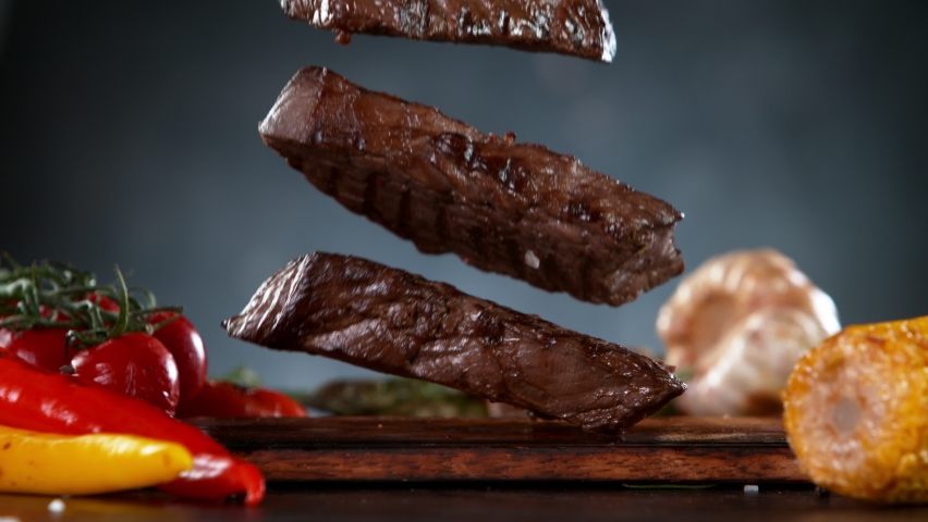 Flying Pieces of Grilled Beef Stock Footage Video (100% Royalty-free ...