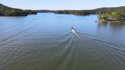 Pontoon Boat Moving Across Busy Lake Stock Footage Video (100% Royalty ...