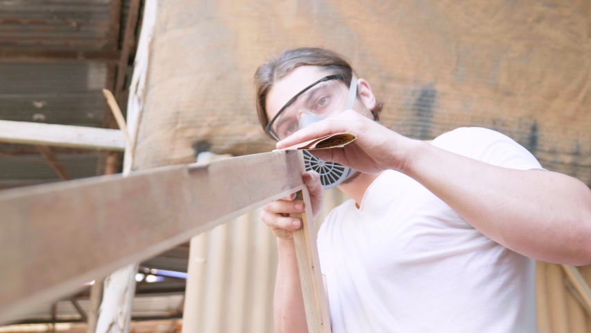 carpenter working on plank clearing wood Stock Footage Video (100% ...