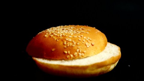 Falling Hamburger Bun On Black Background Stock Footage Video (100% ...