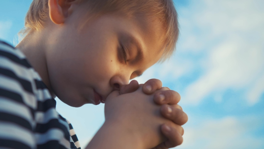 boy kid pray against blue sky Stock Footage Video (100% Royalty-free ...