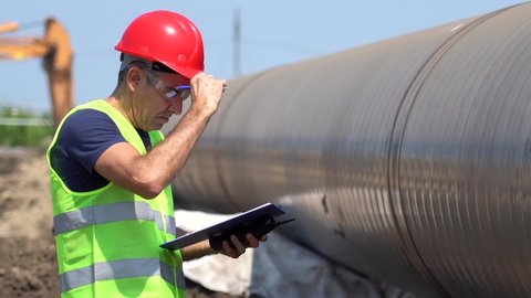Construction Foreman Checking Petrochemical Gas Pipeline Stock Footage ...