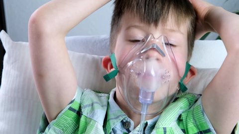 1,296 Kid oxygen mask Stock Video Footage - 4K and HD Video Clips ...