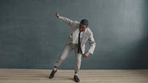 Man black suit dancing Stock Video Footage - 4K and HD Video Clips ...