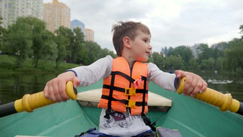 Child rowing boat Stock Video Footage - 4K and HD Video Clips ...