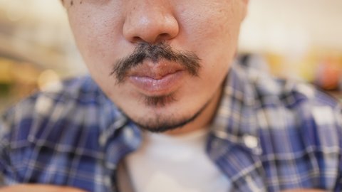 Man licking lips Stock Video Footage - 4K and HD Video Clips | Shutterstock